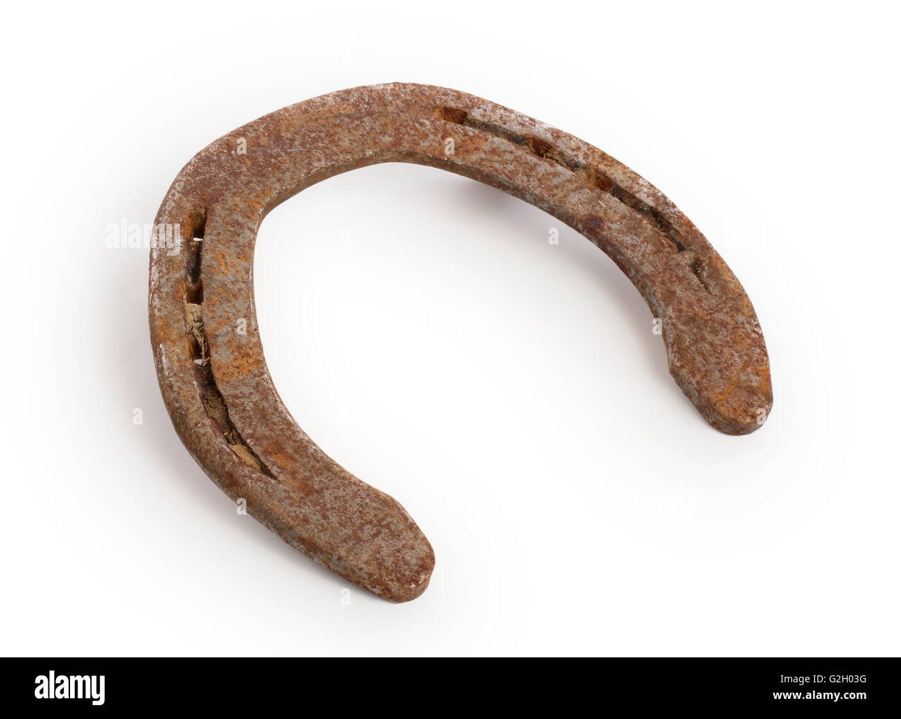 Old rusty horseshoe, isolated on a white background Stock Photo - Alamy