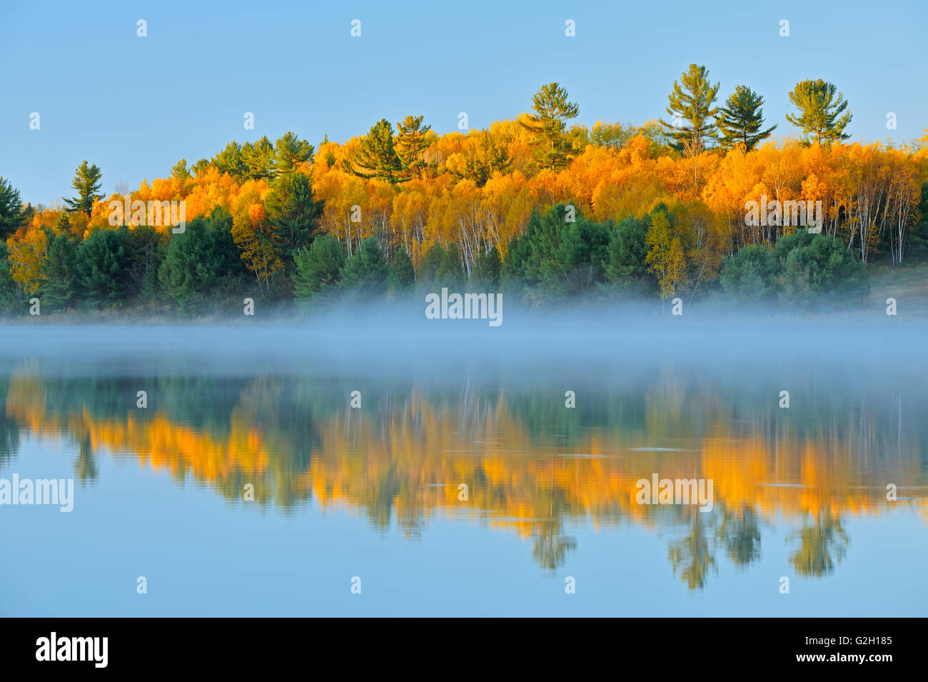 Autumn reflection on the Wanapitei River Near Burwash Ontario Canada ...