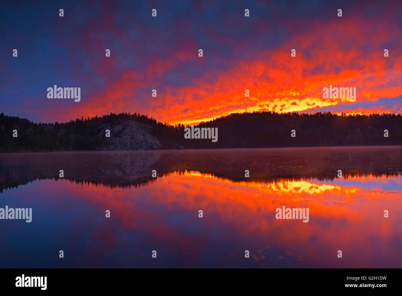 A dawn sky reflected in the the Vermilion RIver Capreol Ontario Canada ...