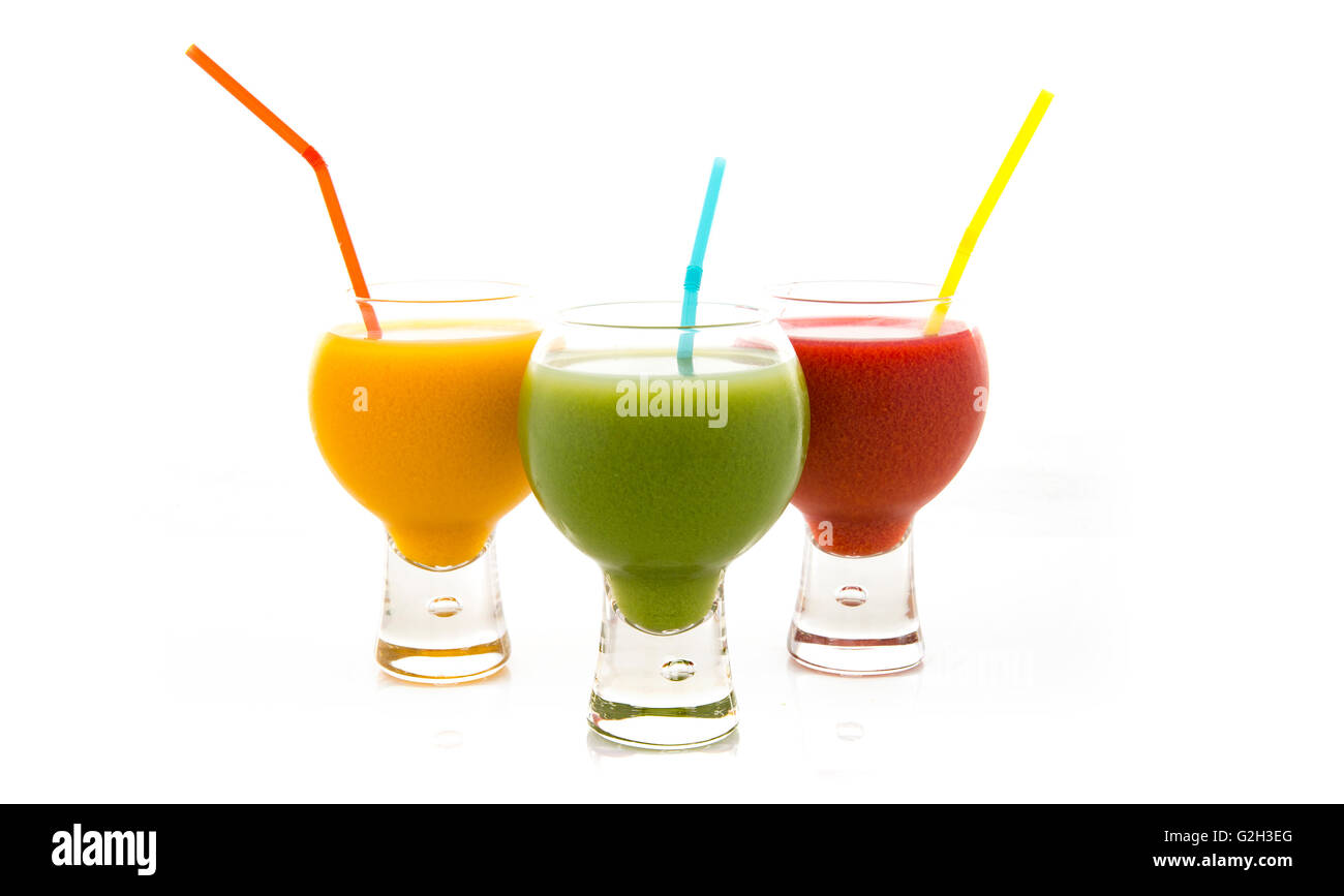 Fresh fruit juices isolated on a white background Stock Photo - Alamy