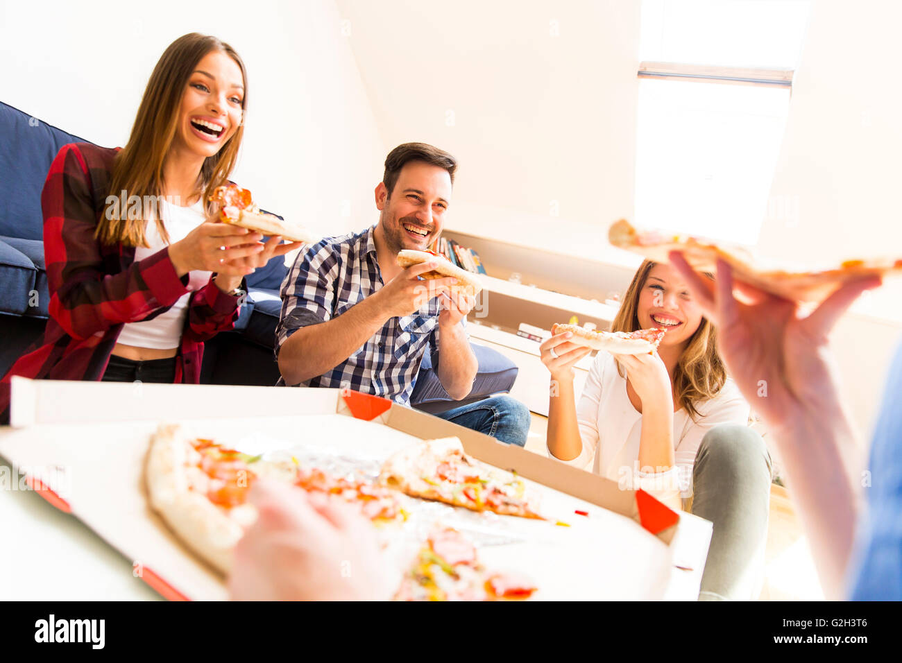 Young people in living hi-res stock photography and images - Alamy