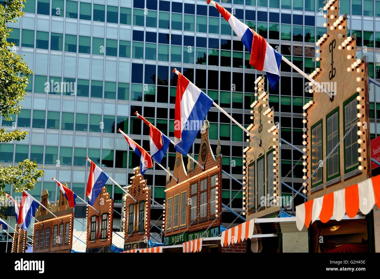 New York City: Gabled facades of 17-18th century Dutch houses and flags ...