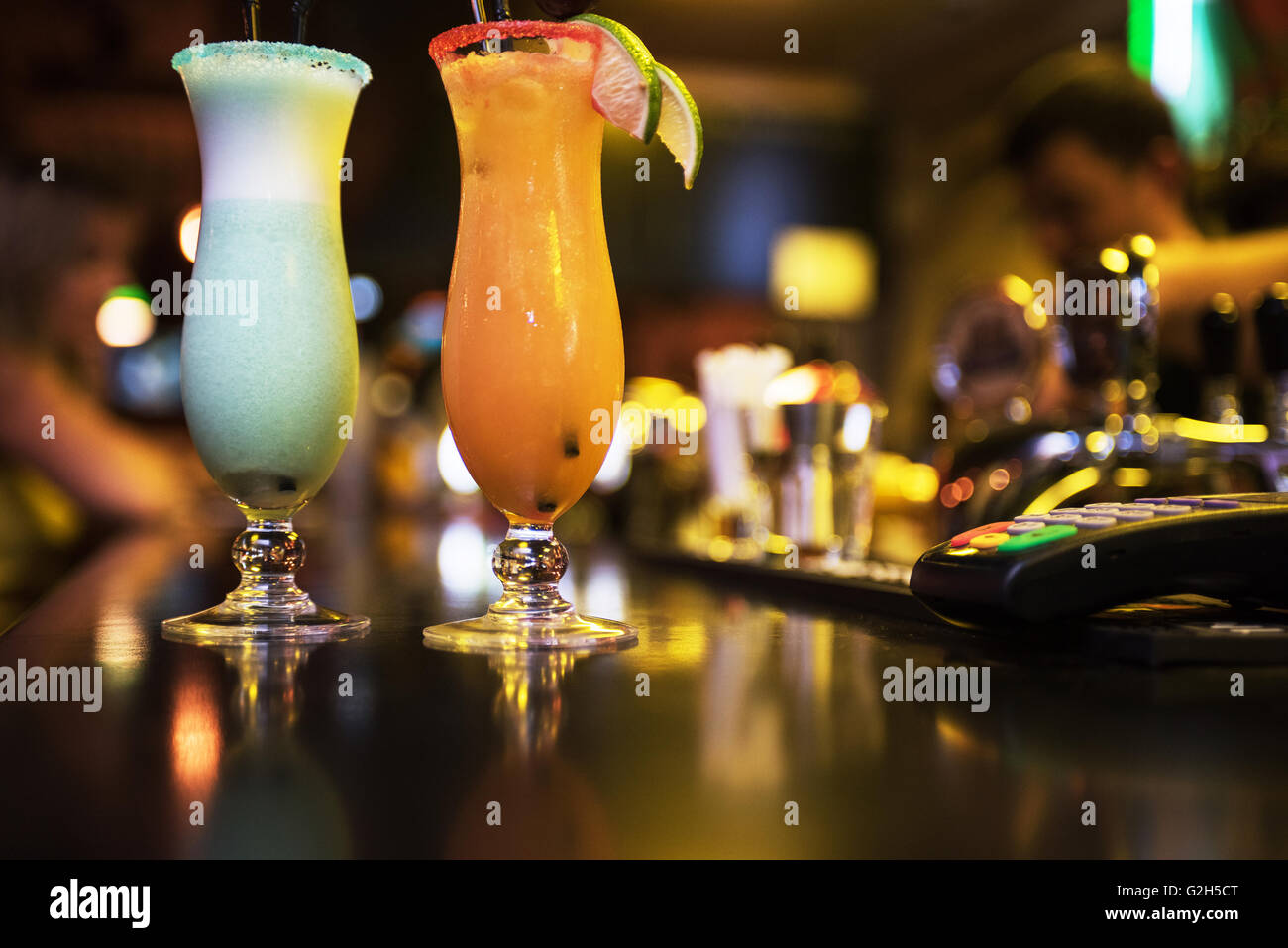 cocktails on bar background Stock Photo - Alamy
