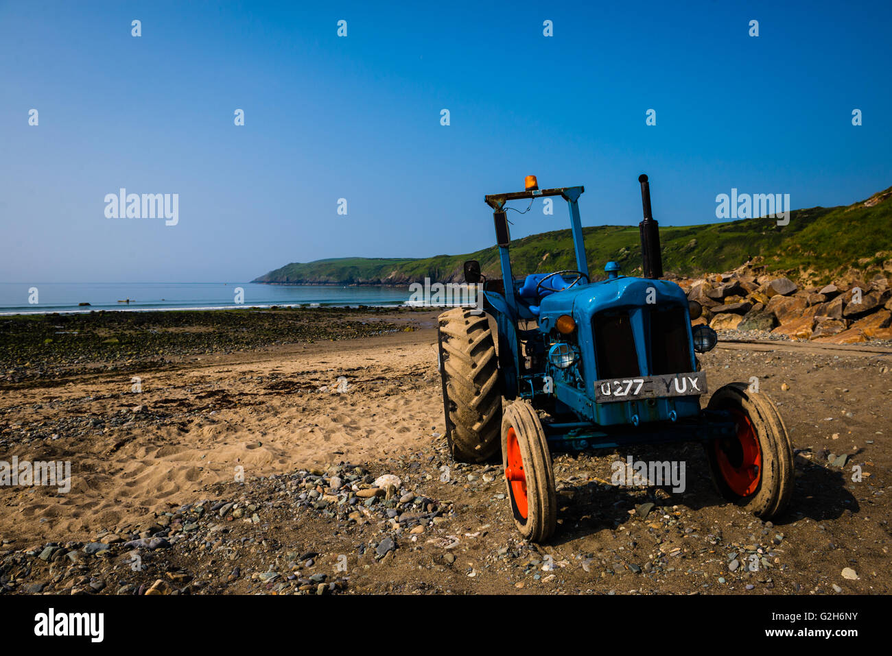 A working tractor used to pull boats ashore, waiting for its next ...