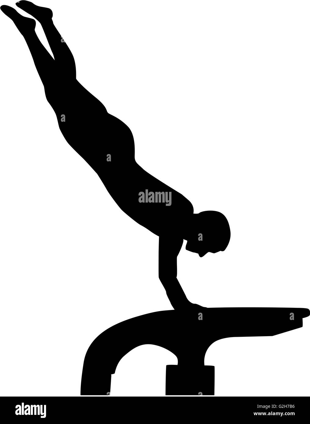 Man exercise on vaulting table Stock Photo - Alamy
