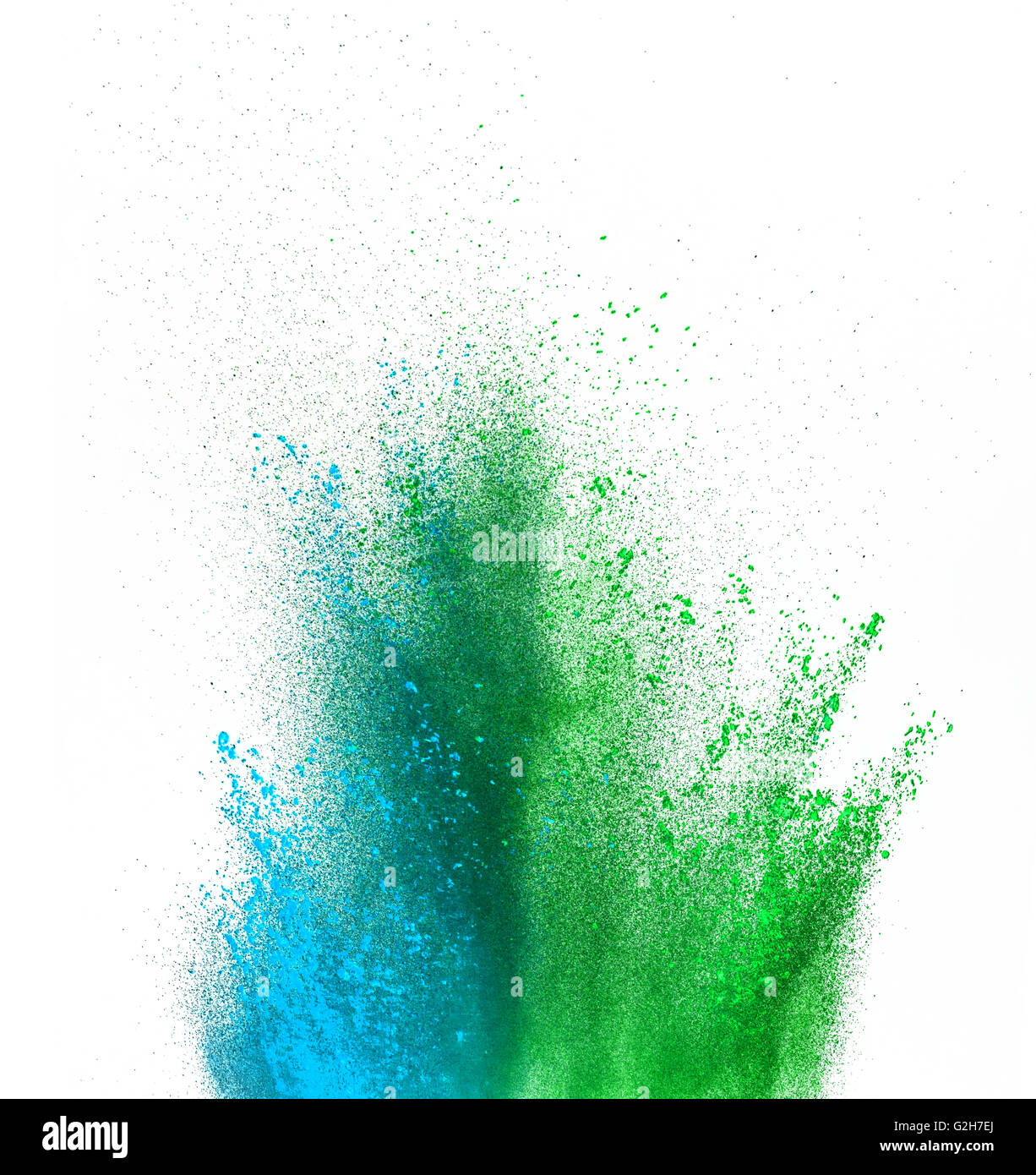 Colored exploding powder isolated on white background Stock Photo - Alamy