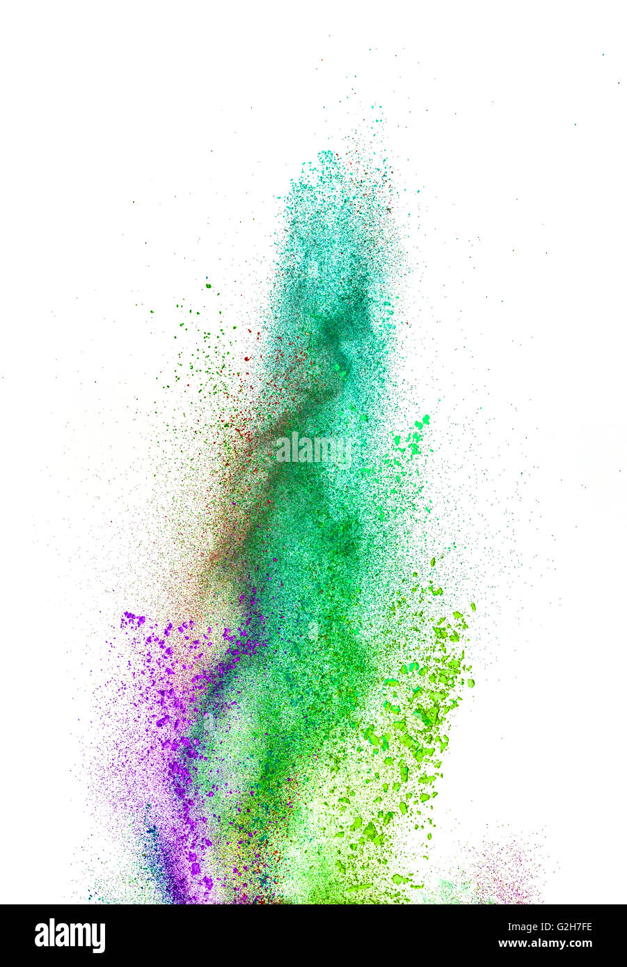 Colored exploding powder isolated on white background Stock Photo - Alamy