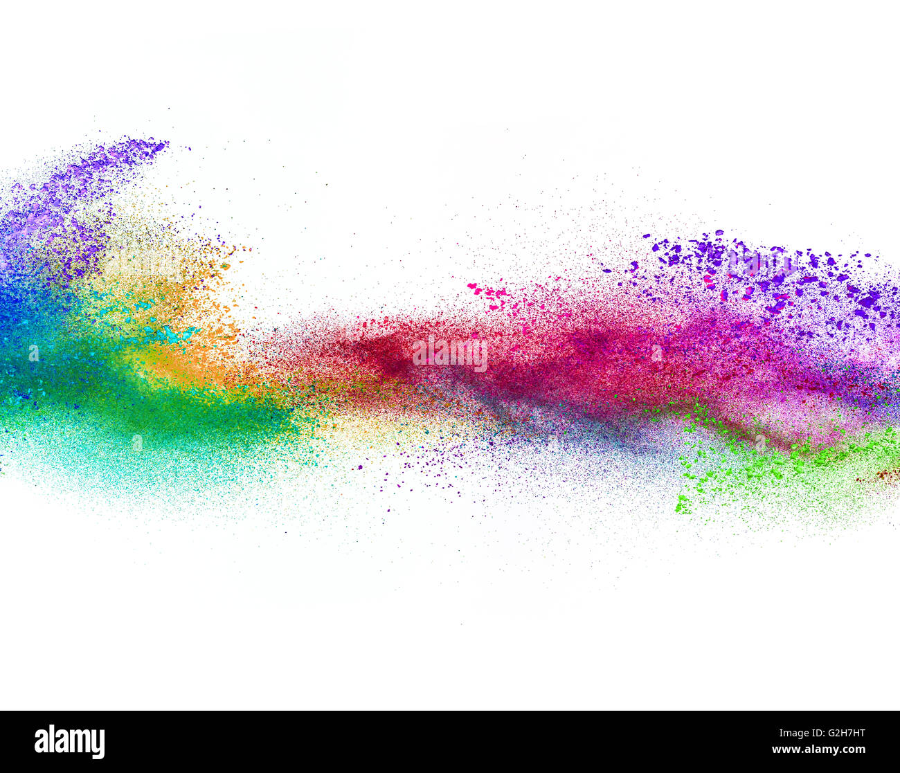 Colored exploding powder isolated on white background Stock Photo - Alamy