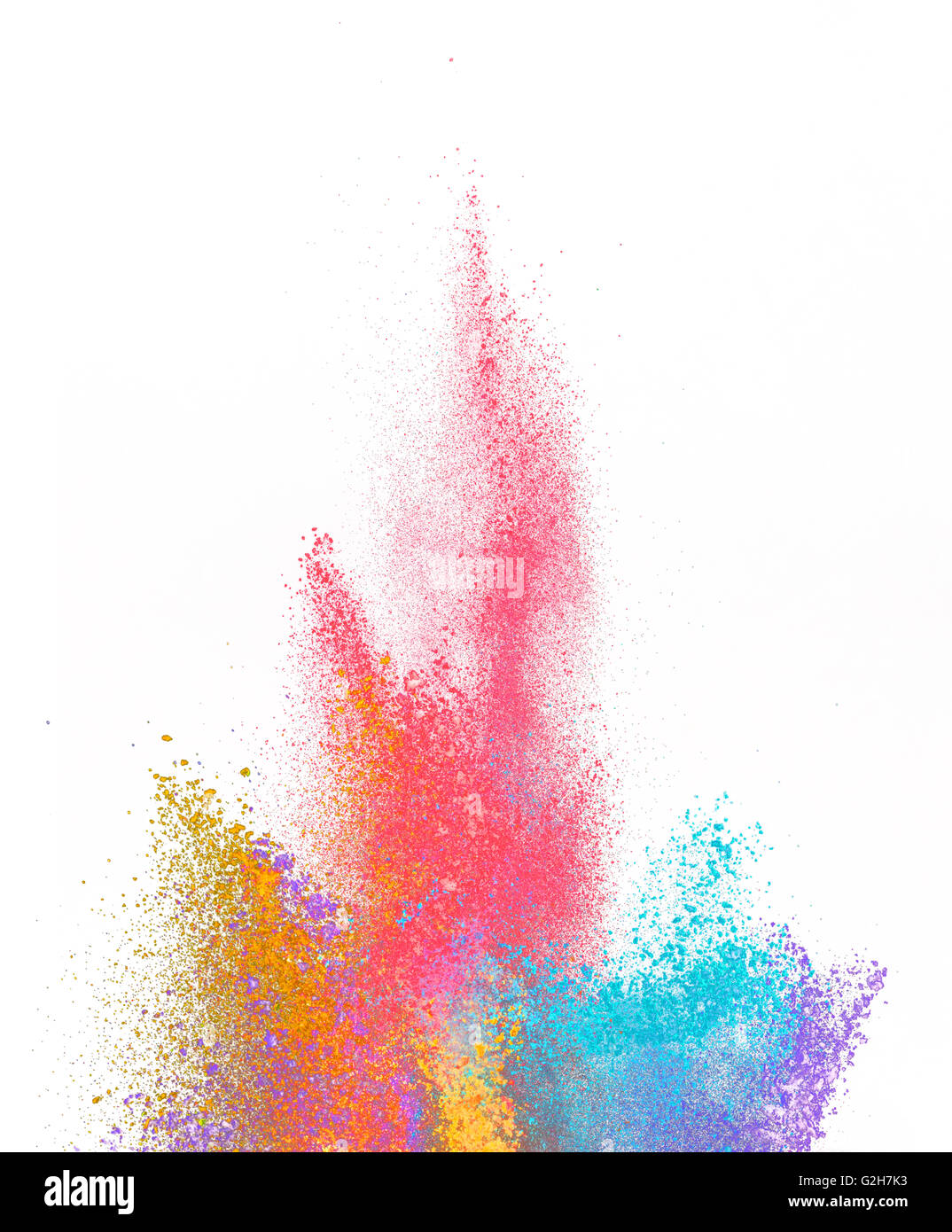 Colored exploding powder isolated on white background Stock Photo - Alamy