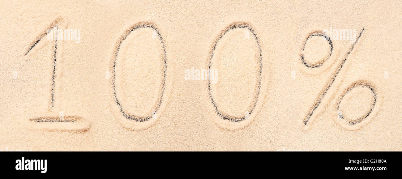 100 % lettering written on sand. Summer beach background Stock Photo ...