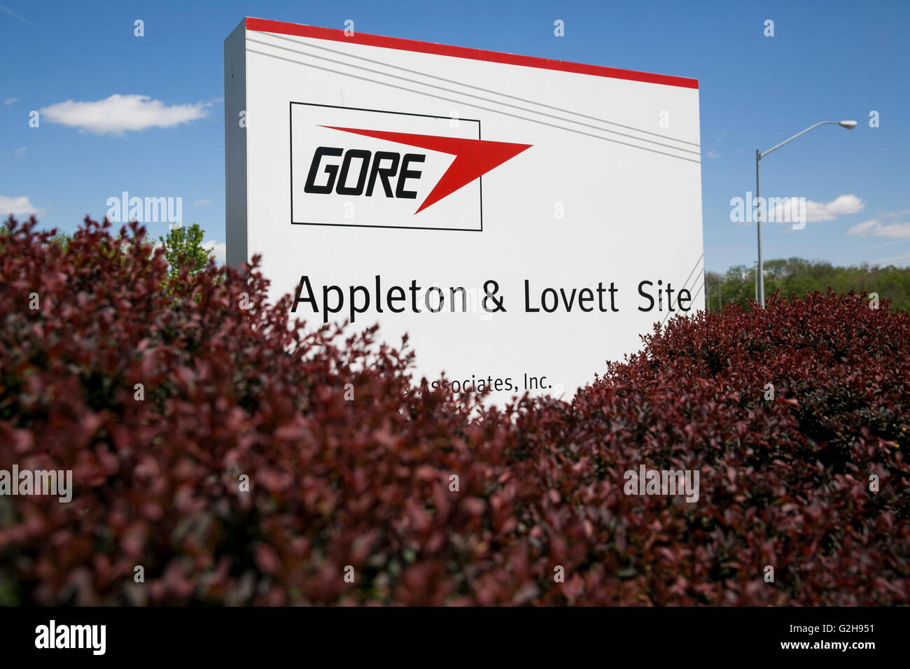 A logo sign outside of a facility occupied by W. L. Gore & Associates ...