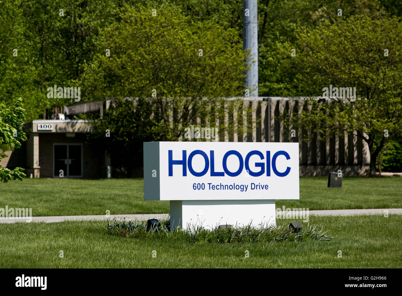 A logo sign outside of a facility occupied by the Hologic Corporation ...