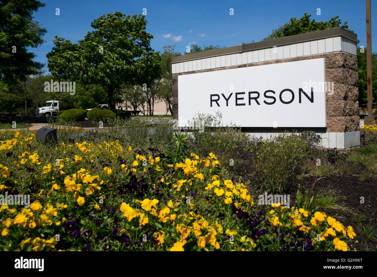 A logo sign outside of a facility occupied by the Ryerson Holding ...