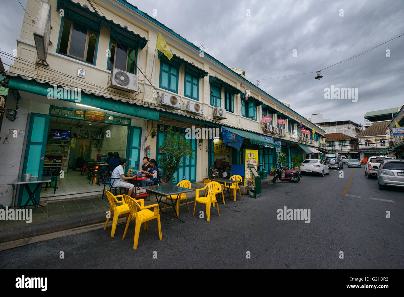 Traditional row shophouses in the atmospheric Phraeng Phuton Square in ...