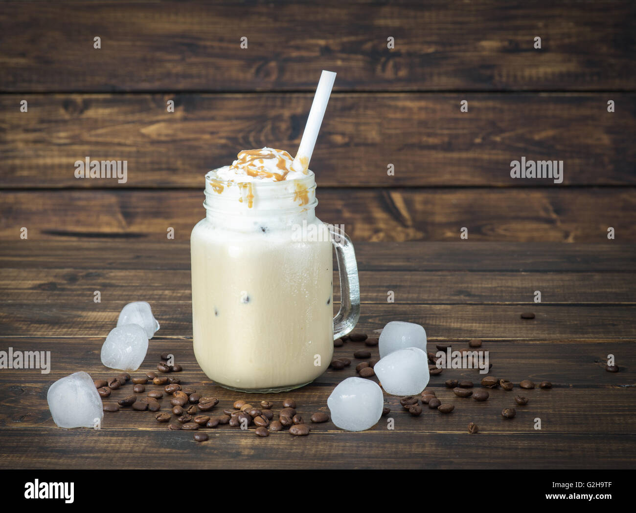 Ice coffee in a glass mug Stock Photo - Alamy