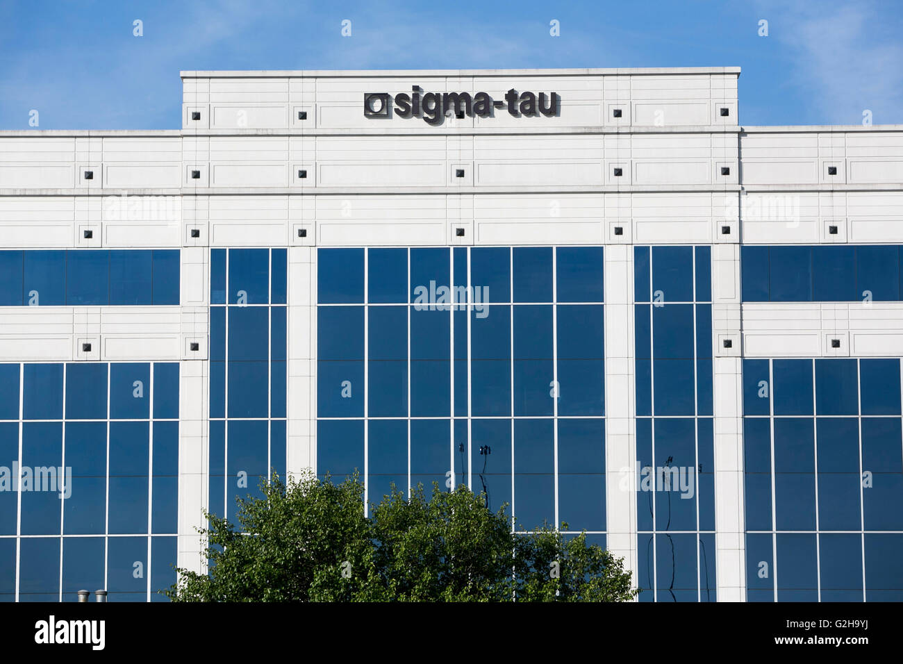 A logo sign outside of a facility occupied by Sigma-Tau Pharmaceuticals ...