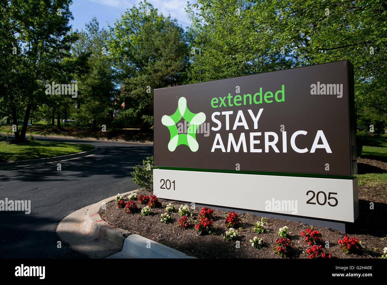 A logo sign outside of an Extended Stay America hotel in Gaithersburg ...