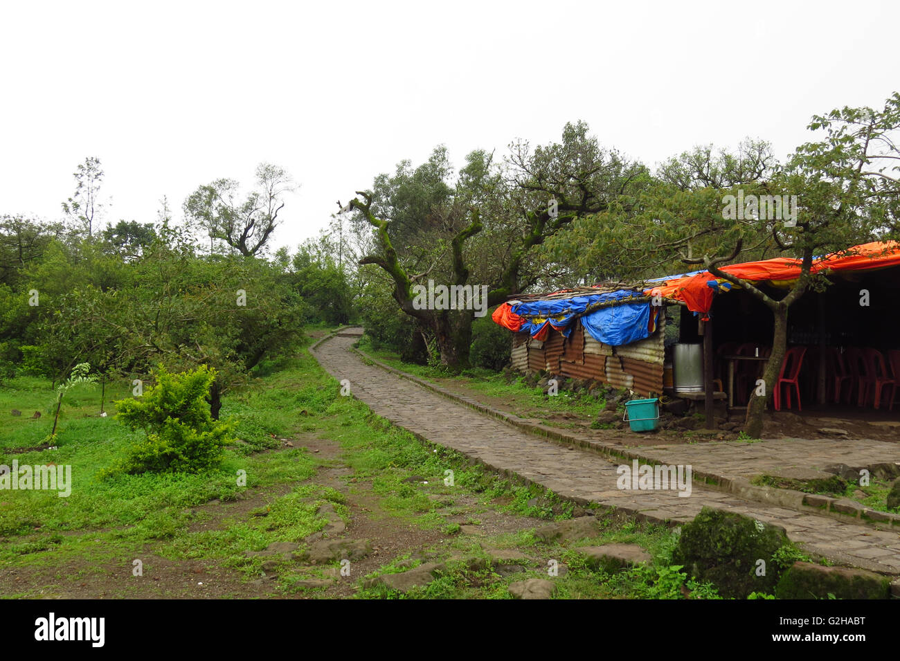 A makeshift restaurant made of tin sheets and plastic on an old fort in ...