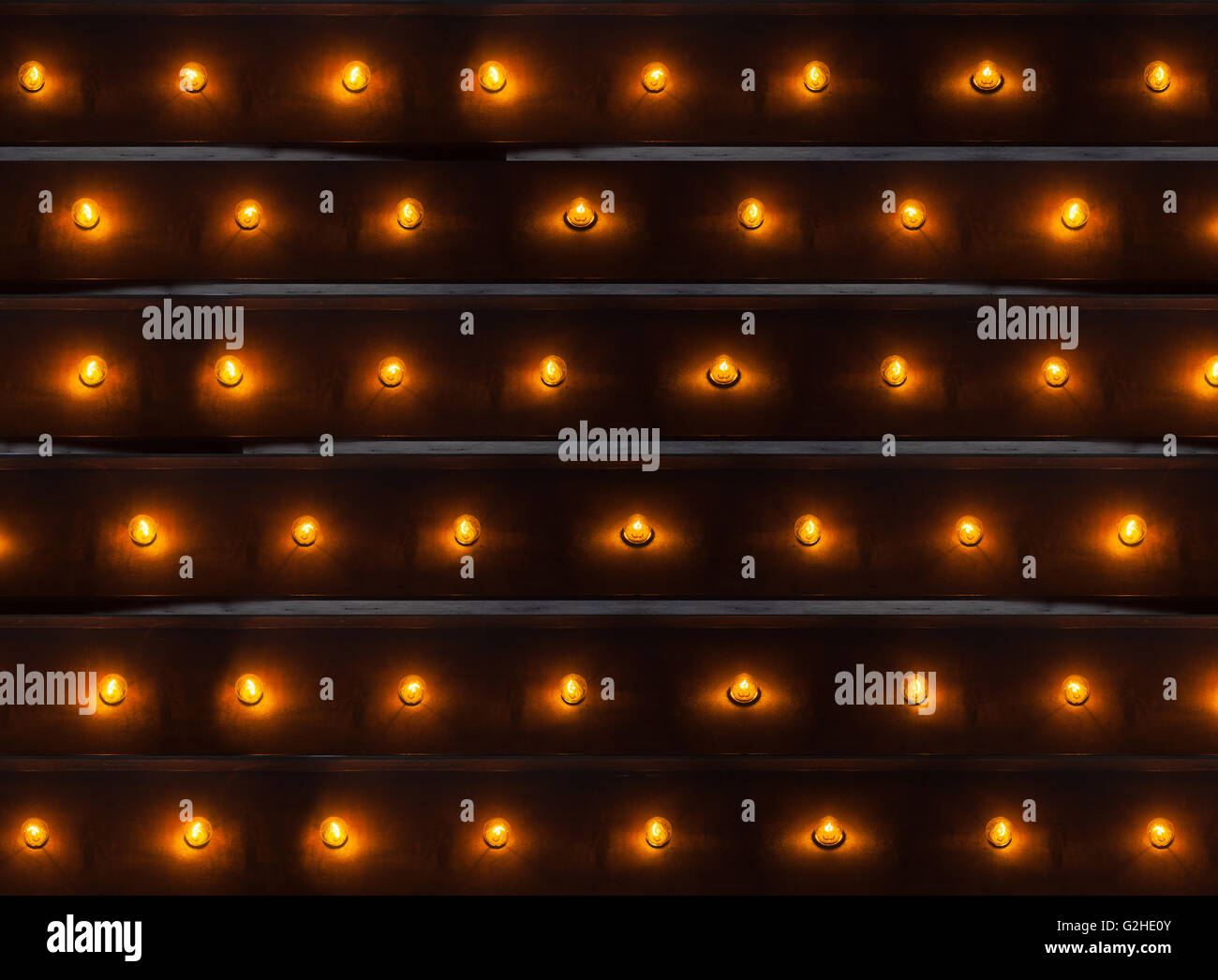 dark texture of yellow light bulbs included Stock Photo - Alamy