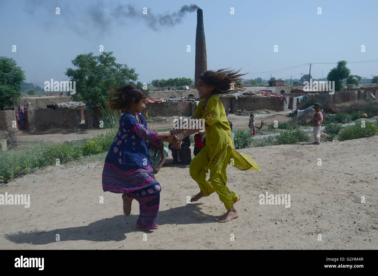 Children in poor suburb on hi-res stock photography and images - Alamy