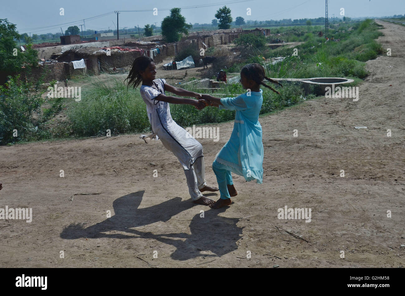 Children in poor suburb on hi-res stock photography and images - Alamy