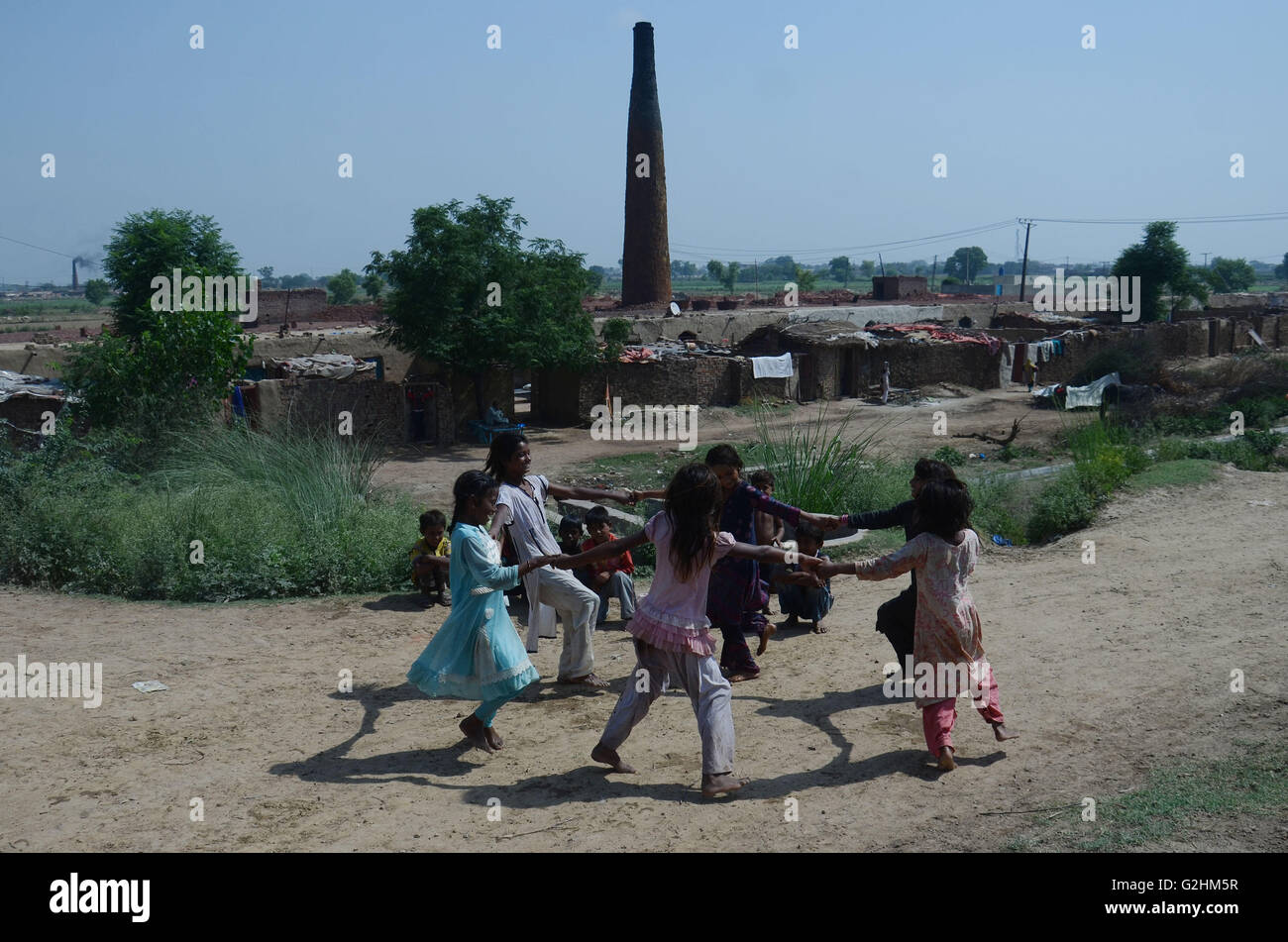 Children in poor suburb on hi-res stock photography and images - Alamy