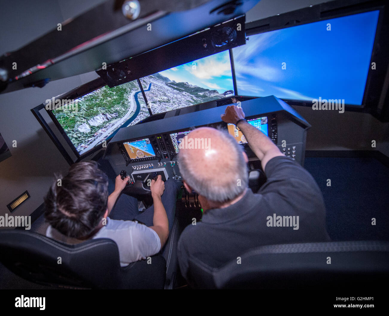 Berlin, Germany. 31st May, 2016. Visitors controlling the flight ...
