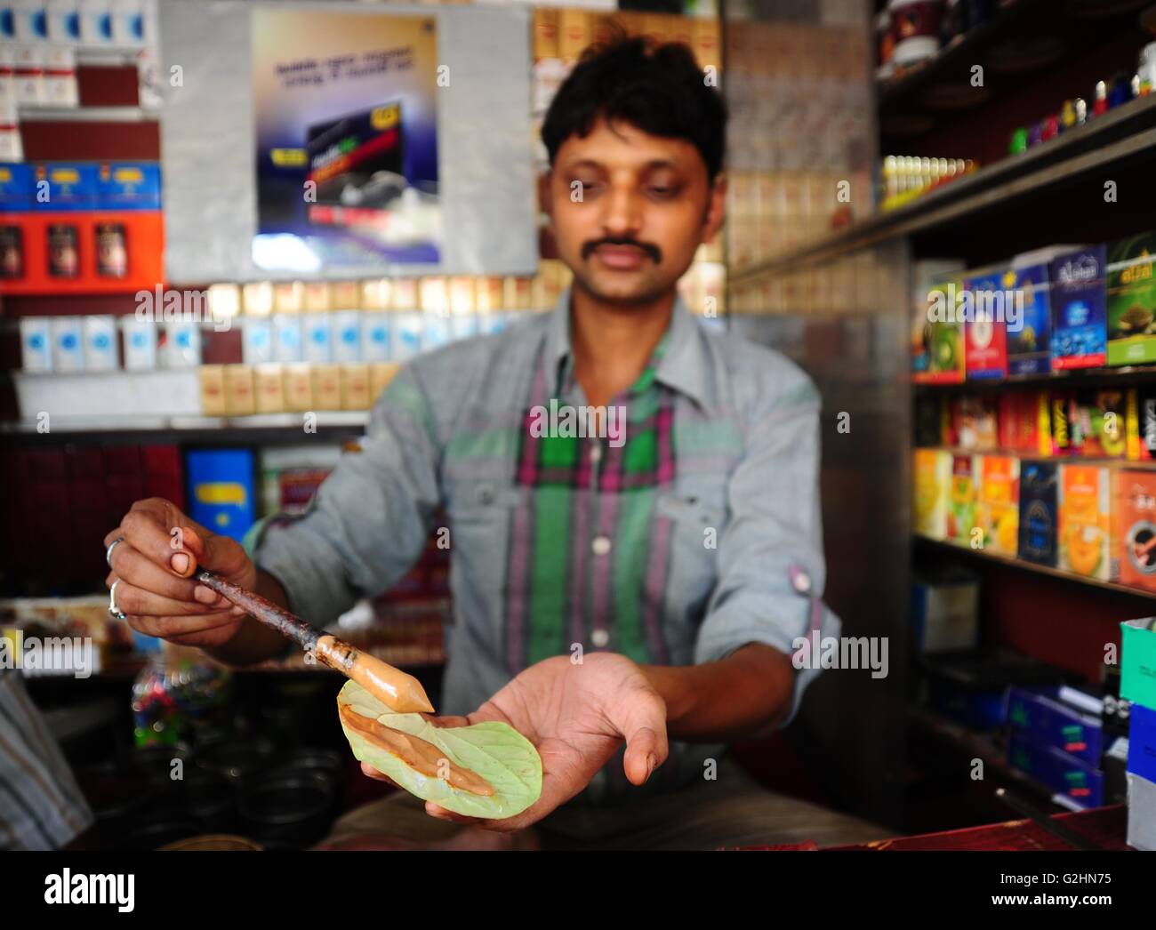 Allahabad, Uttar Pradesh, India. 31st May, 2016. An Indian shopkeeper ...