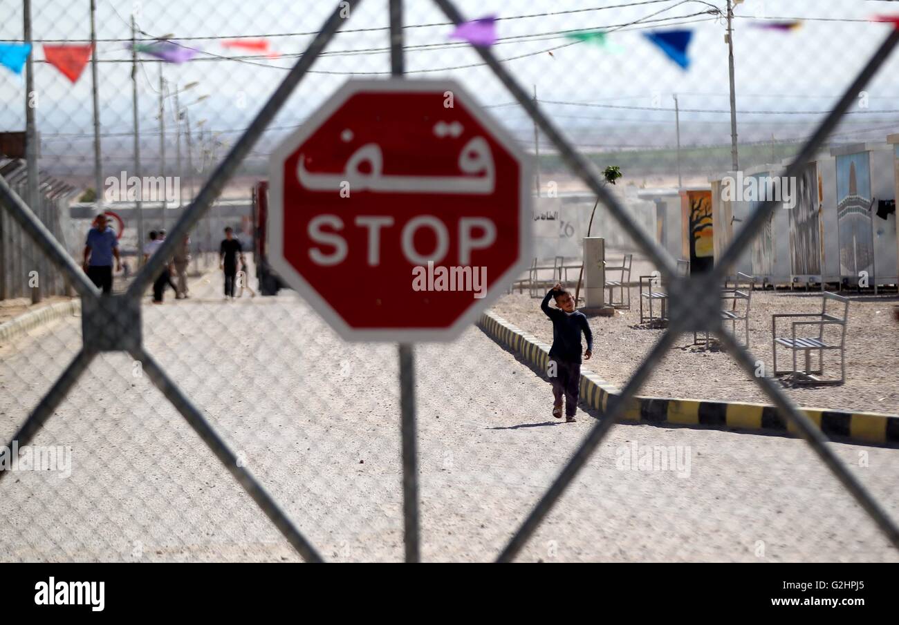Zarqa, Jordan. 31st May, 2016. A Syrian boy walks at the Mrajeeb Al ...