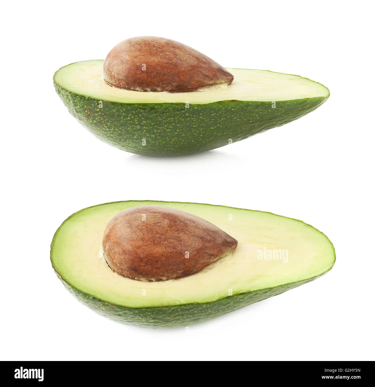 Cut in half open avocado fruit Stock Photo - Alamy