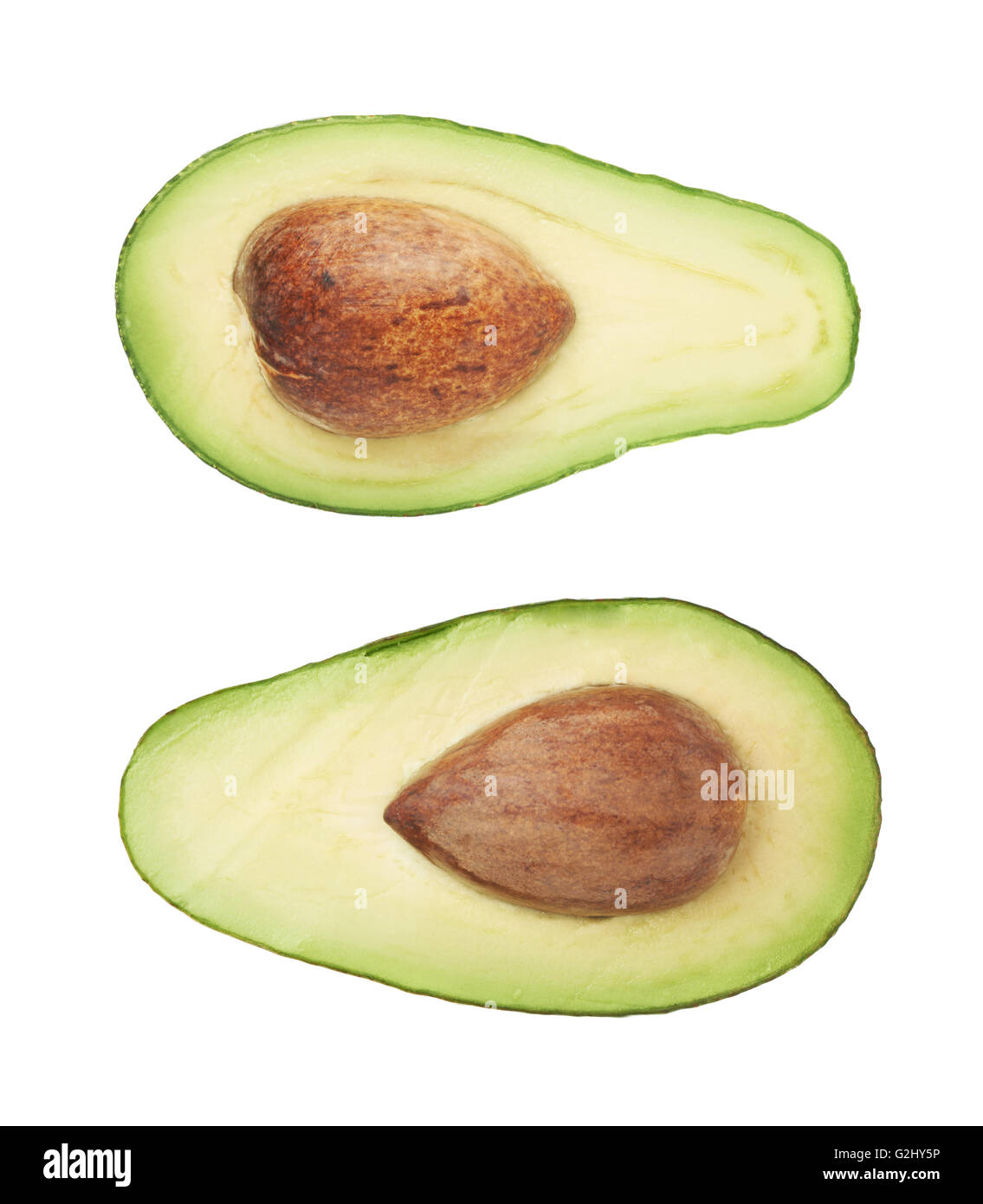 Cut in half open avocado fruit Stock Photo - Alamy