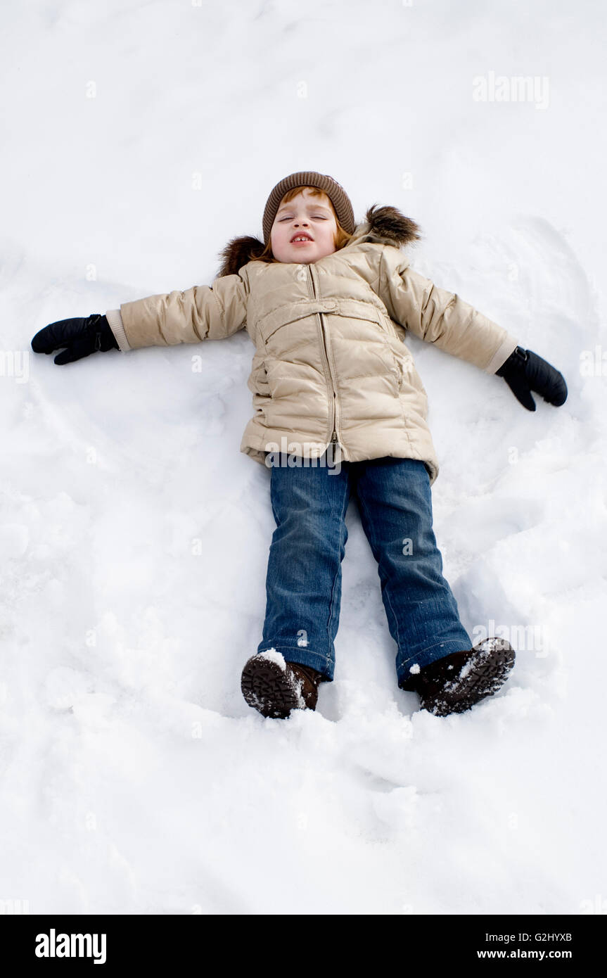 Children making snow angels hi-res stock photography and images - Alamy