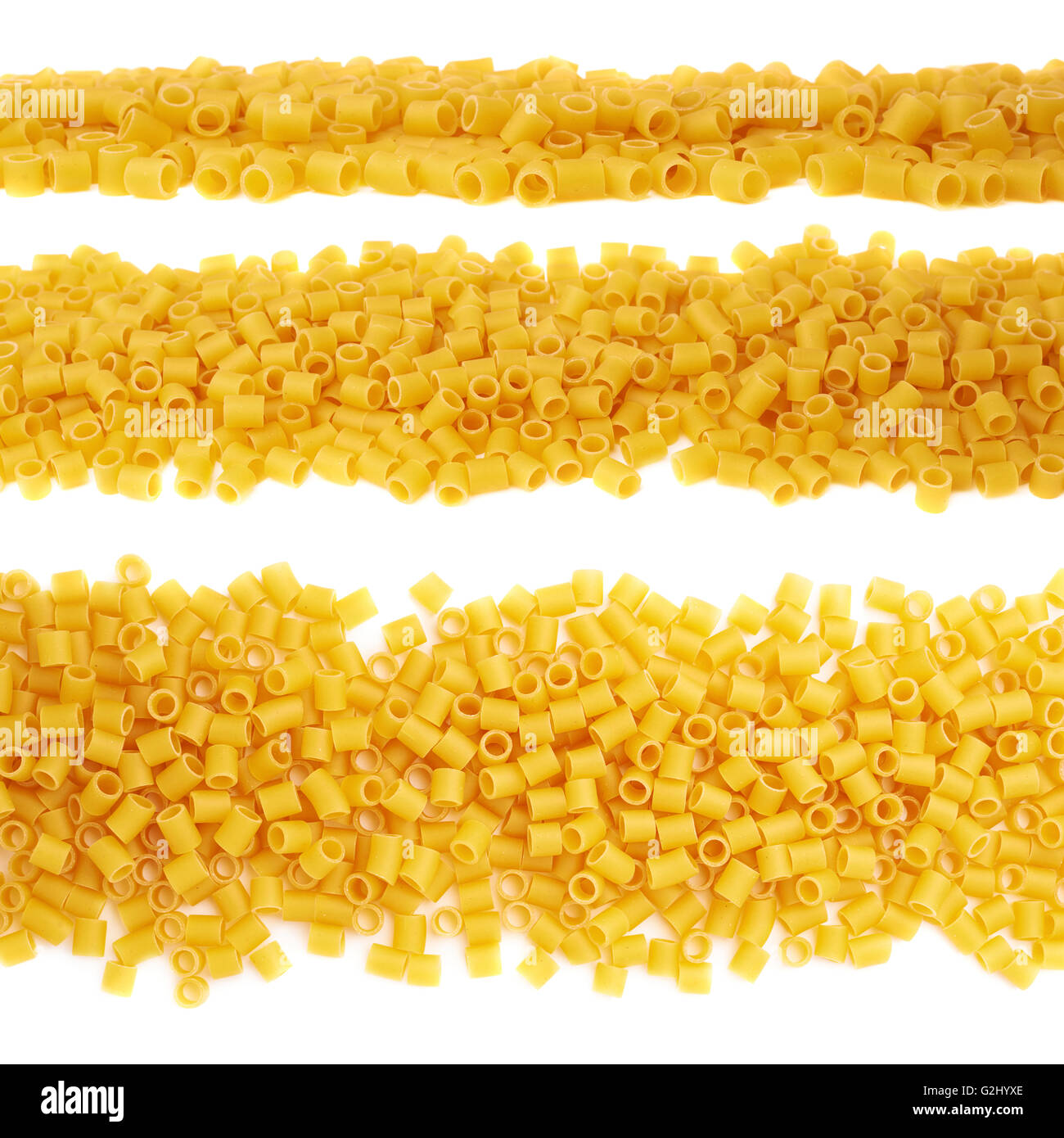 Line made of dry ditalini pasta over isolated white background Stock ...