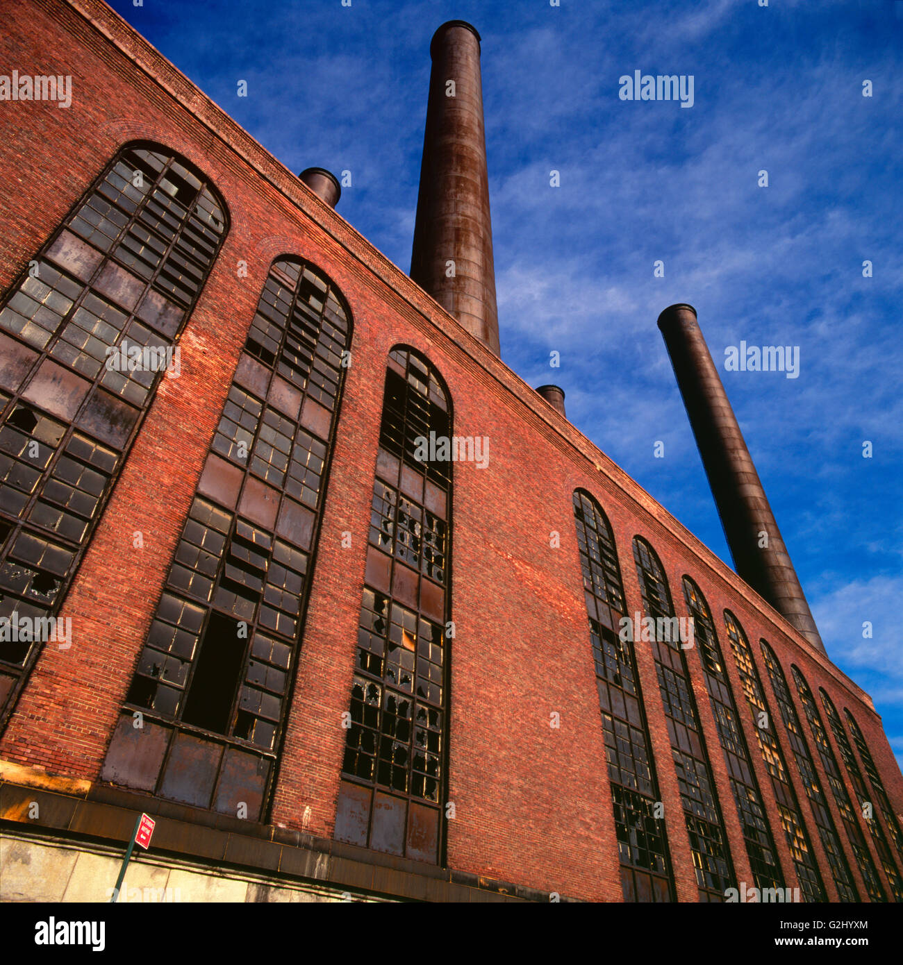 Old Vacant Factory with Smoke Stacks Stock Photo - Alamy