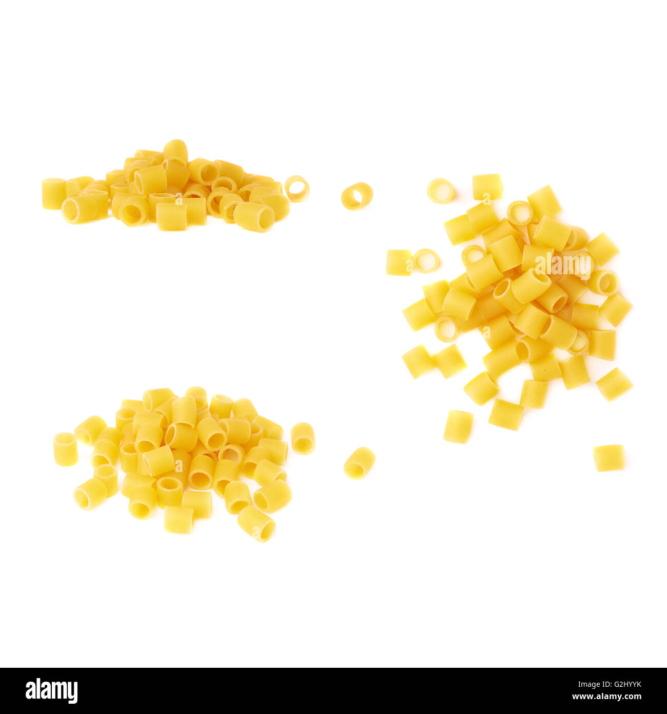 Pile of dry ditalini pasta over isolated white background Stock Photo ...