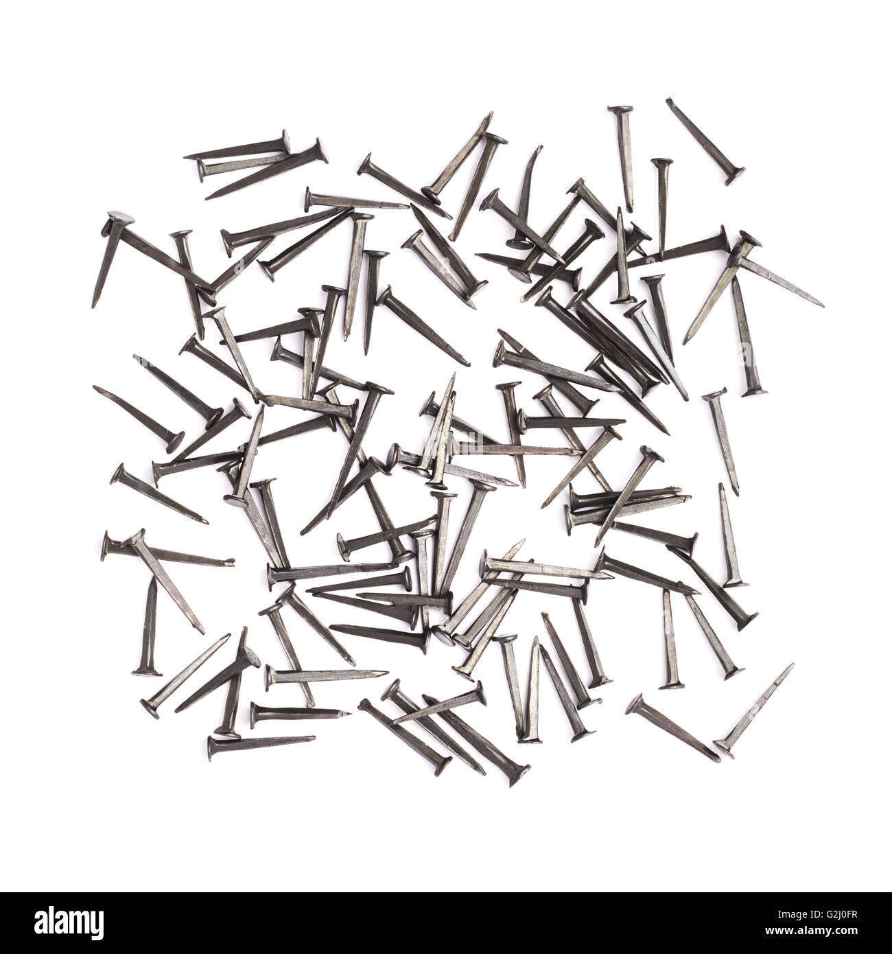 Scattered nails over surface isolated over white background Stock Photo ...