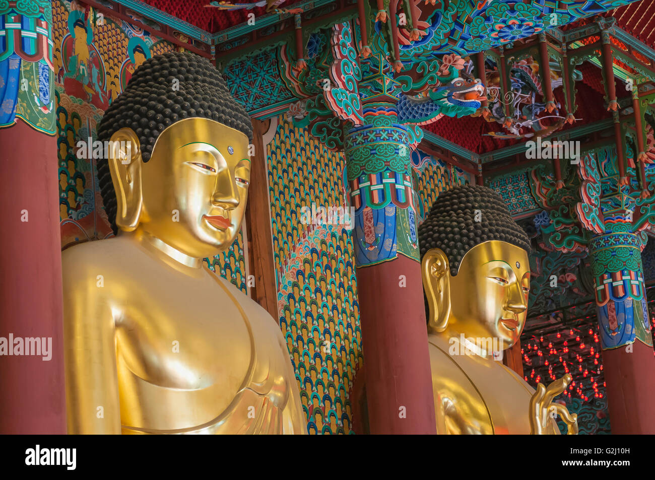 Golden Buddha statues inside the Daeungjeon, Main Dharma Hall, Jogyesa ...