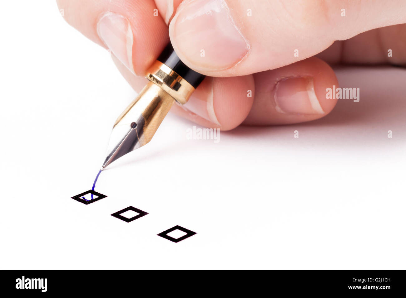 Female hand holding fountain pen and Marking in top check-box Stock ...