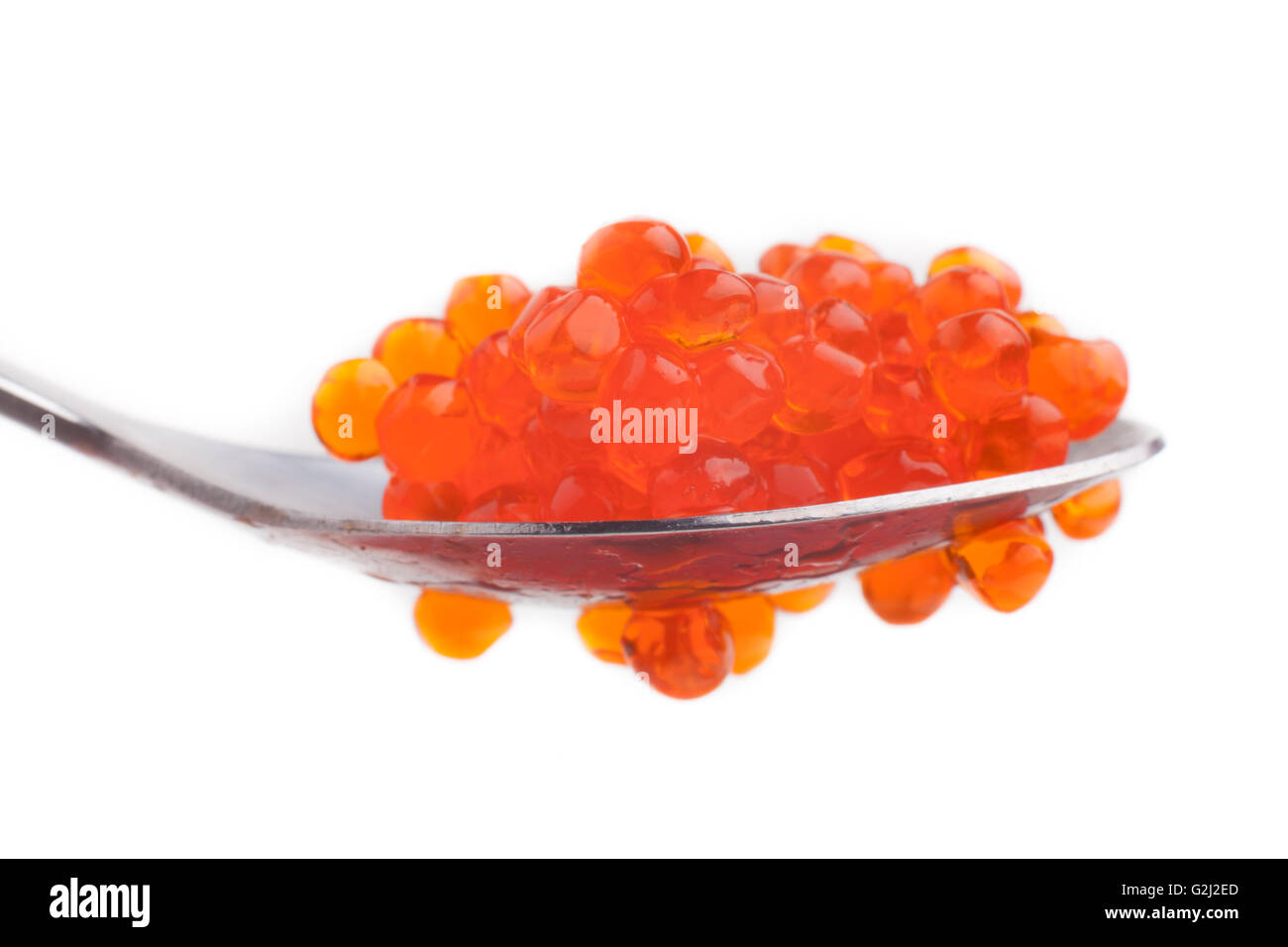 Read caviar with silver color spoon isolated on white background Stock ...