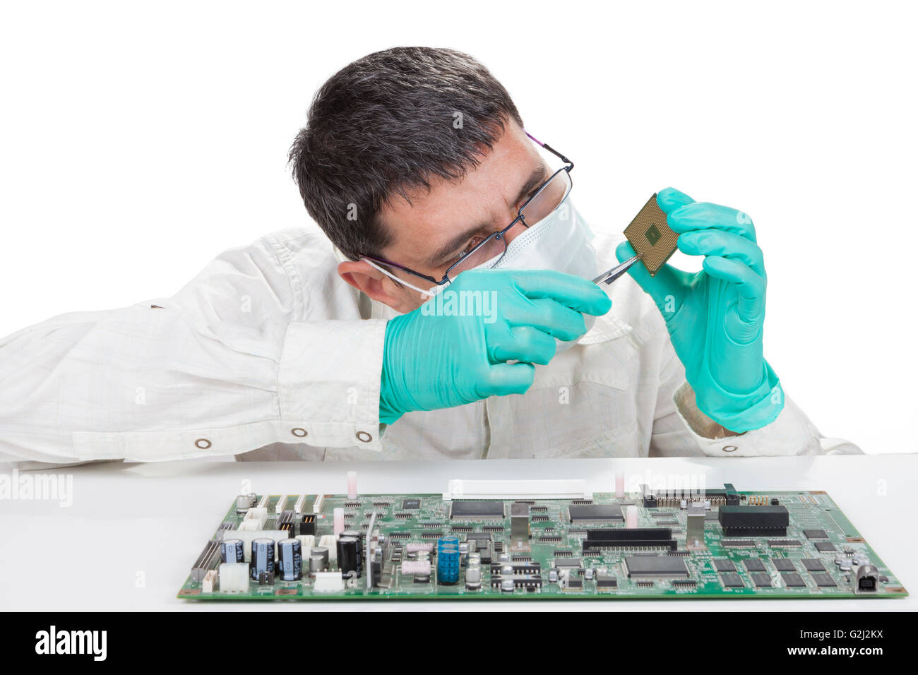 Verifying microchip with magnifying glass on white background Stock ...