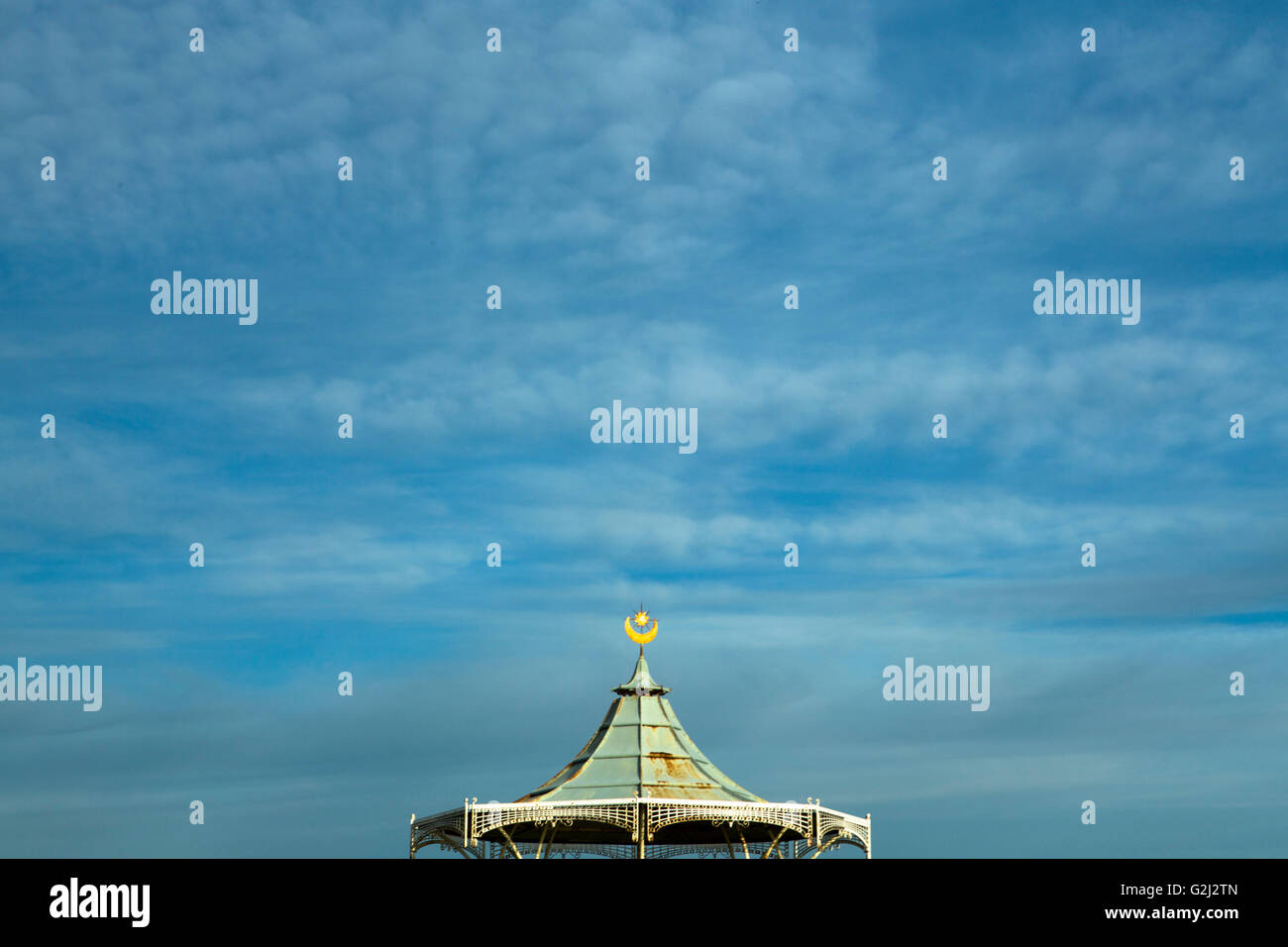 top of a bandstand in Portsmouth, with blue skies. Centered. Bakground ...