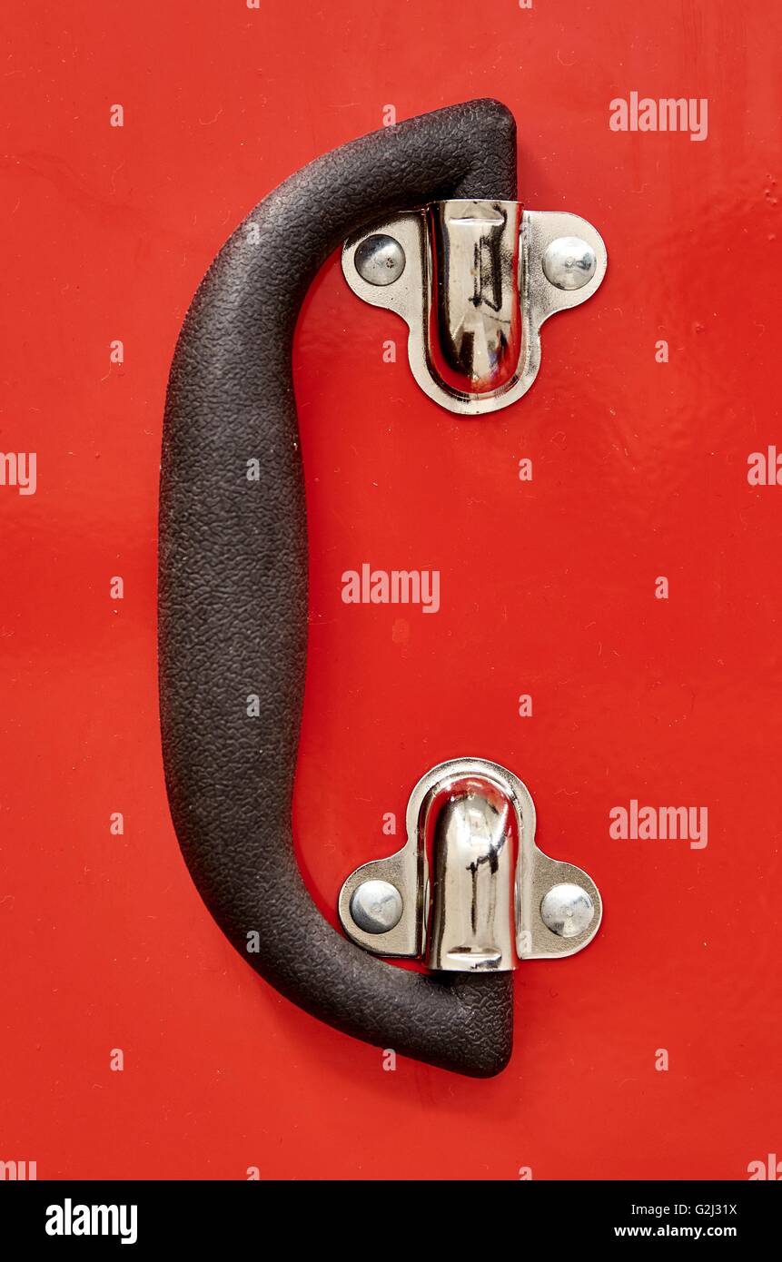 A close up photo of a tool box carry handle Stock Photo - Alamy