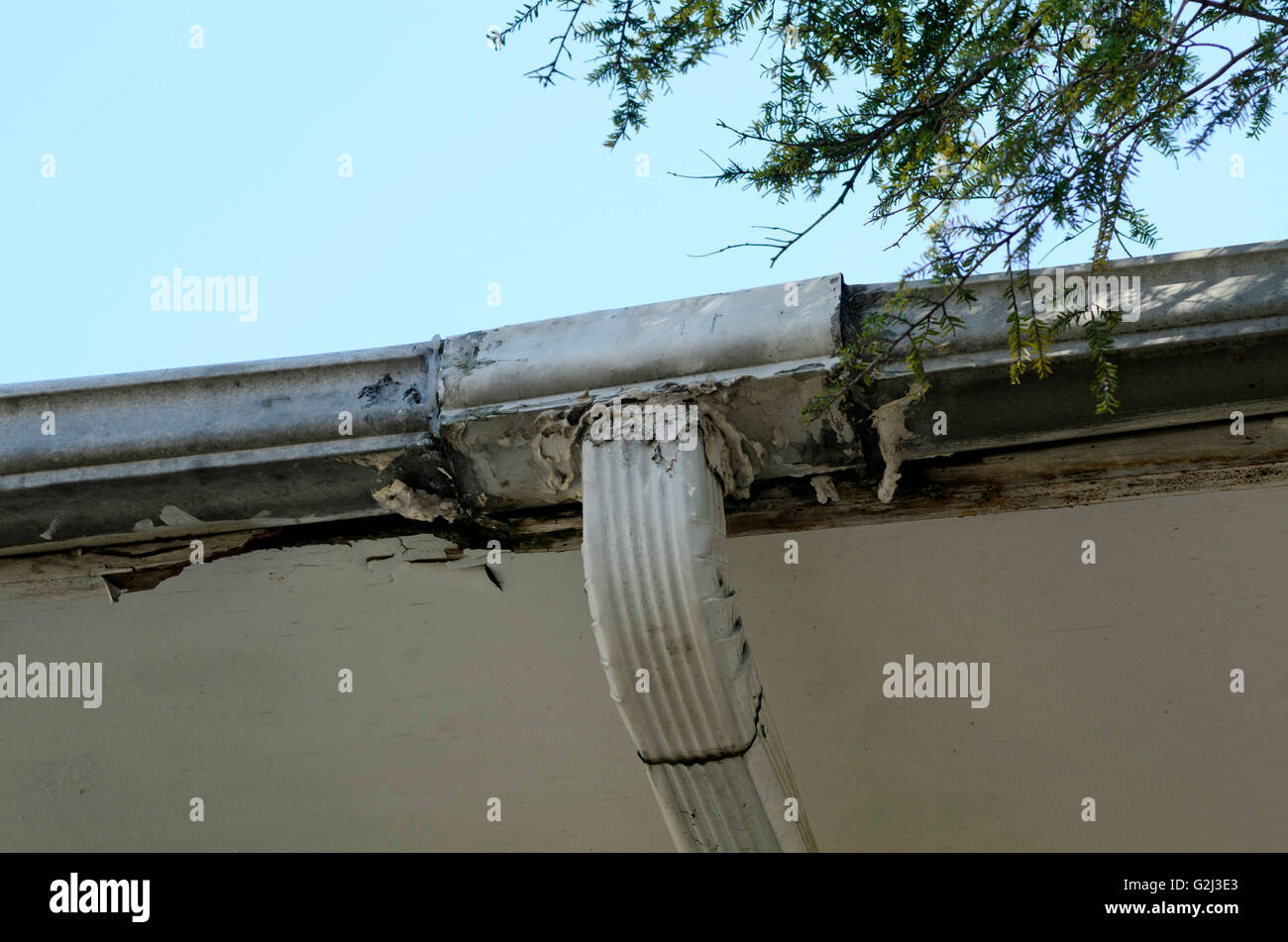 Rotting gutter and drain pipe Stock Photo - Alamy