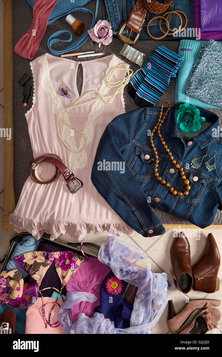 Preparing to Pack Luggage with Clothes and Accessories Spread out on ...