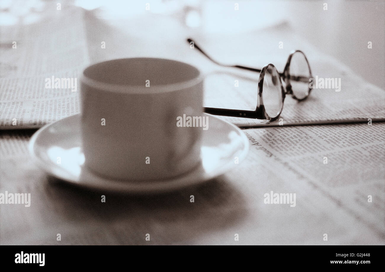 Cup coffee newspaper glasses hi-res stock photography and images - Alamy