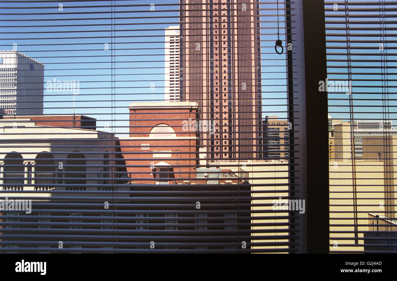 Atlanta Skyline Through Window Blinds Stock Photo - Alamy
