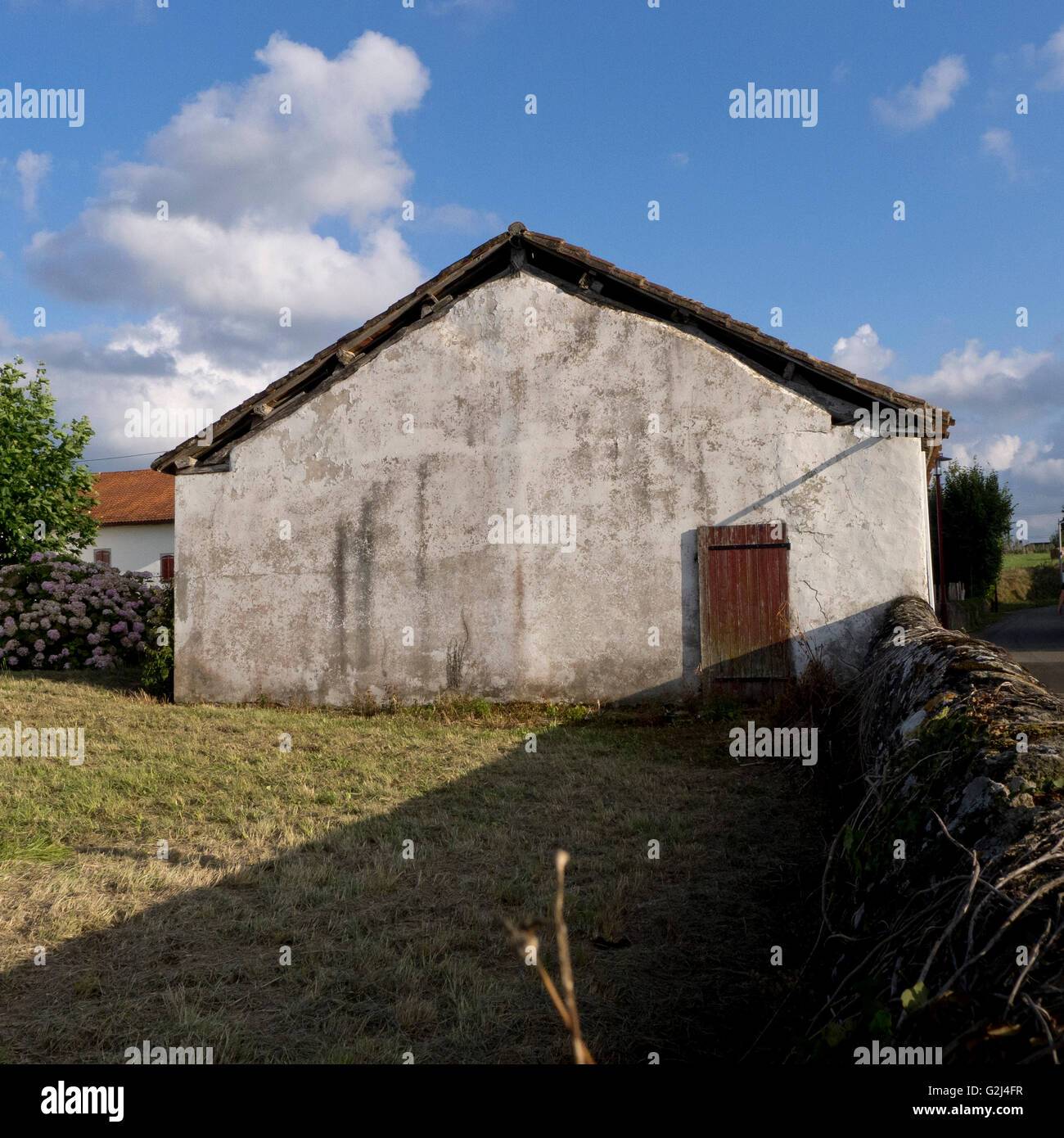Sloping roof stone wall hi-res stock photography and images - Alamy
