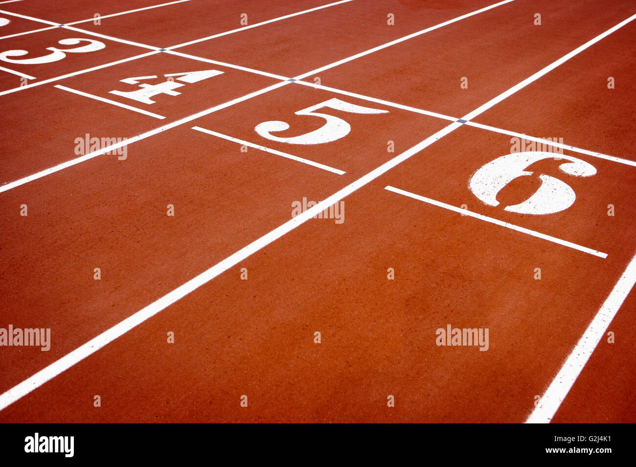 Running Track with Numbered Lanes Stock Photo - Alamy