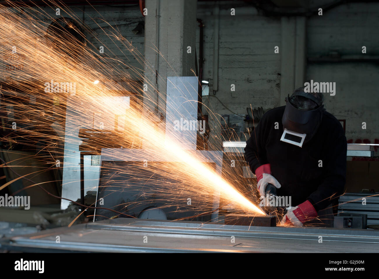 grinding sparks in a heavy industry workshop Stock Photo - Alamy