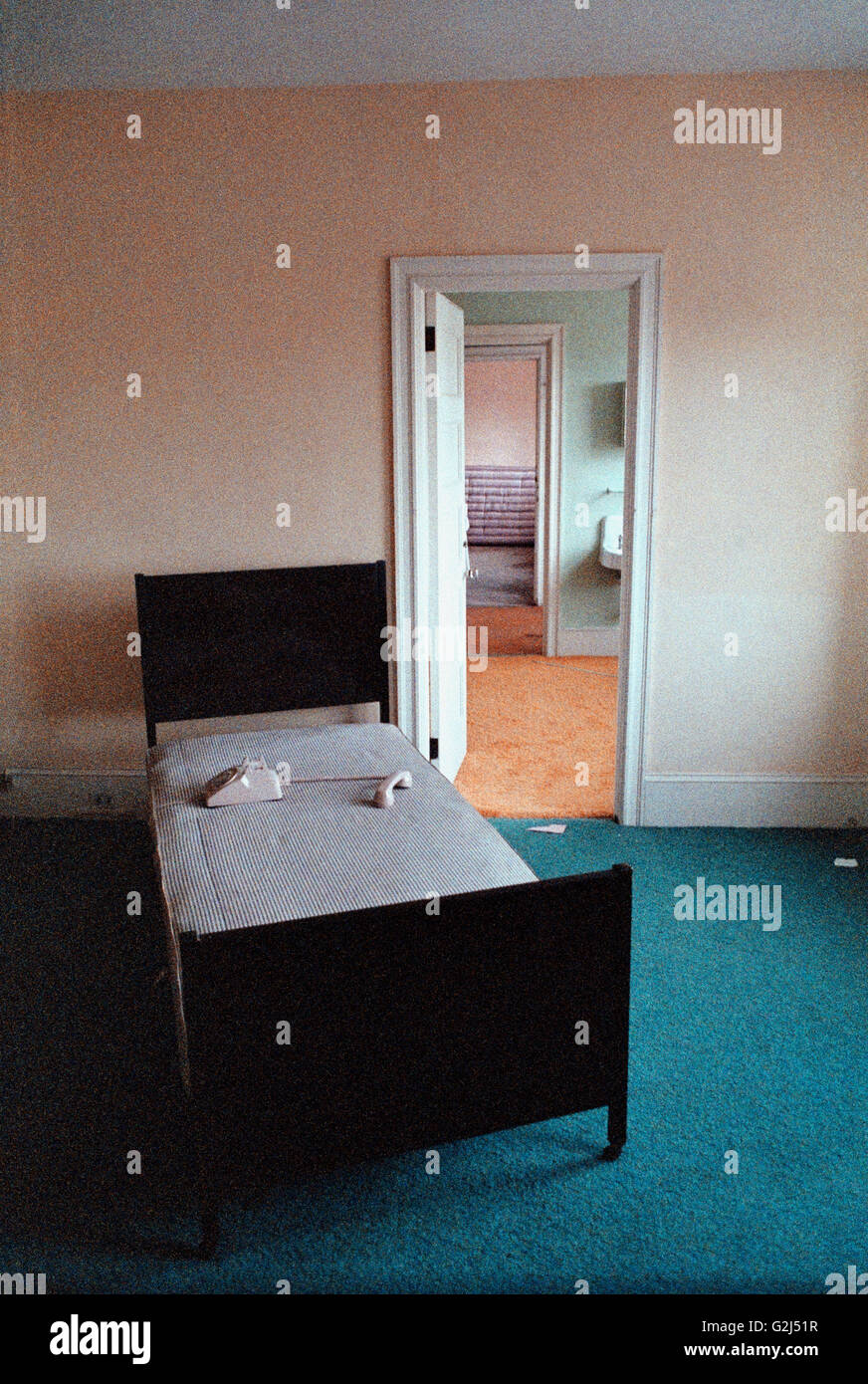 Bed with Telephone Stock Photo - Alamy